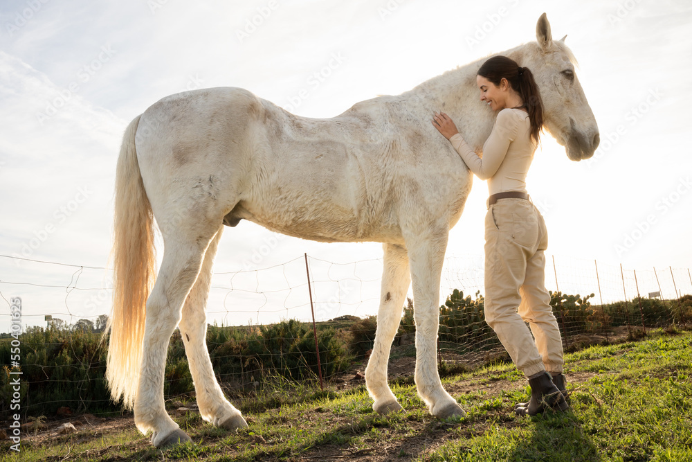 Woman hugging horse. Woman and horse. Person and horse. Girl and horse ...