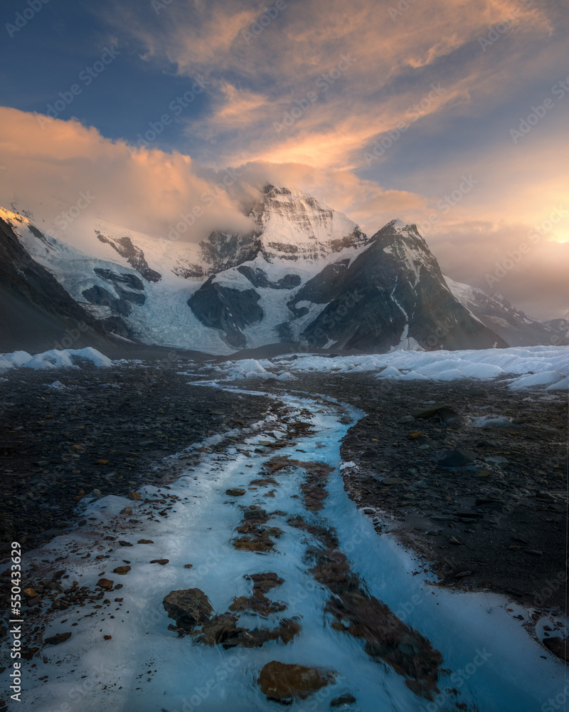 A stream of snow melt formed a nice S-curve, and as the sun set the ...