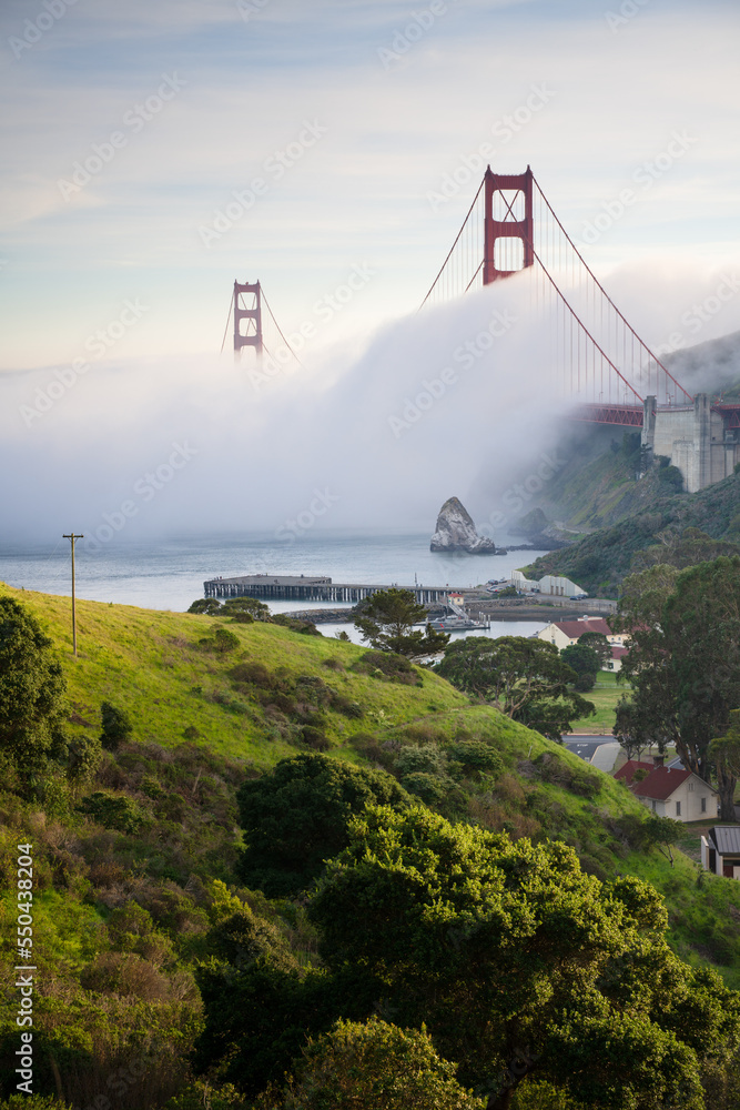 Golden Gate Bridge towering over the hills of Cavallo Point and Fort ...