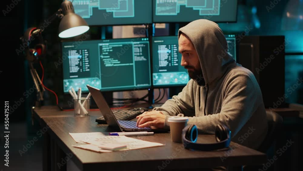 Hacking thief breaking through cyber security system and stealing data ...