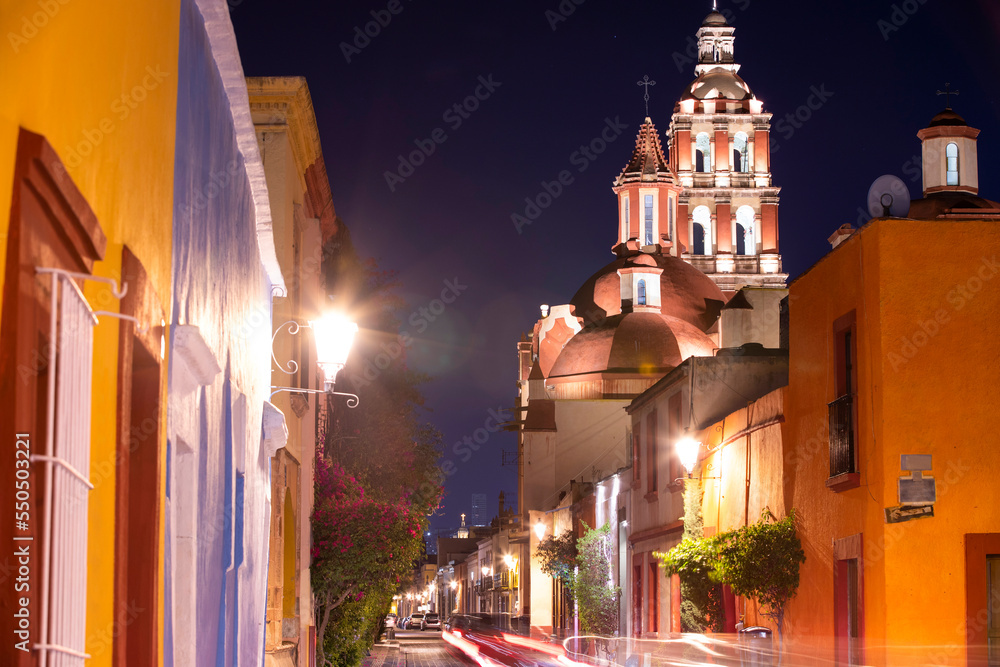 Twilight view of the Spanish colonial architecture and historic church ...