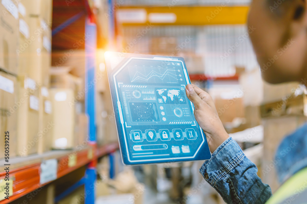 Inventory staff hand holding infographic Tablet for Advanced Digital ...