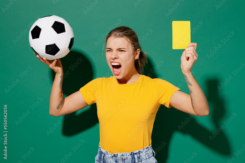 Young sad woman fan wear basic yellow t-shirt cheer up support football ...