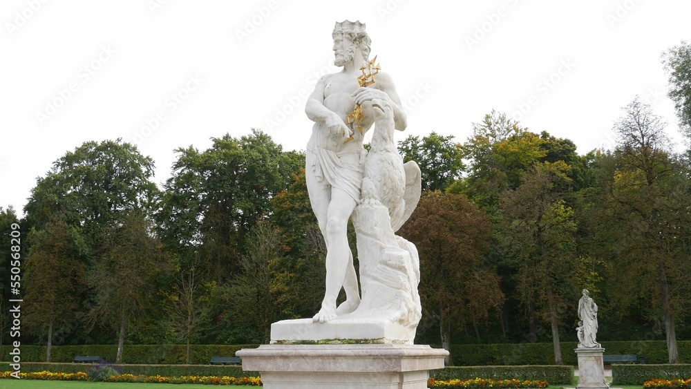 Mythological statue of Greek god Jupiter at Nymphenburg palace gardens ...