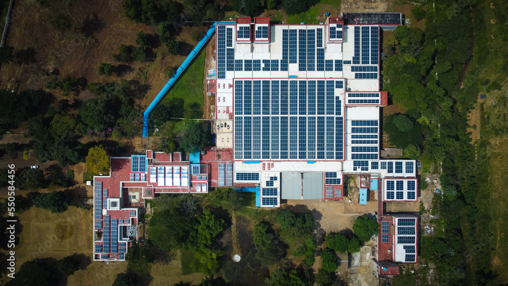 Energy self-sufficient factory using solar rooftop and battery energy ...