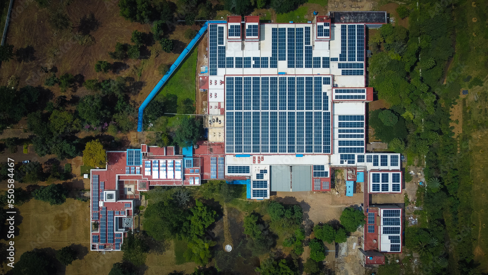 Energy self-sufficient factory using solar rooftop and battery energy ...
