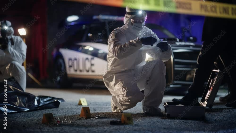 Crime Scene Investigation Team Working on a New Murder Case. Forensics ... Crime Scene Investigation Team Working on a New Murder Case. Forensics ...