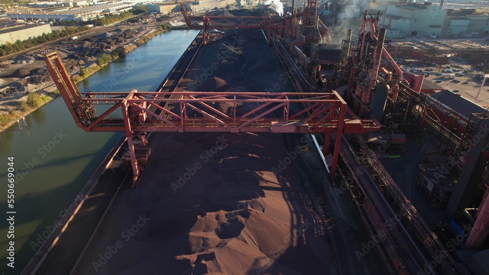 Steel factory aerial. Industry metallurgical plant at golden hour ...