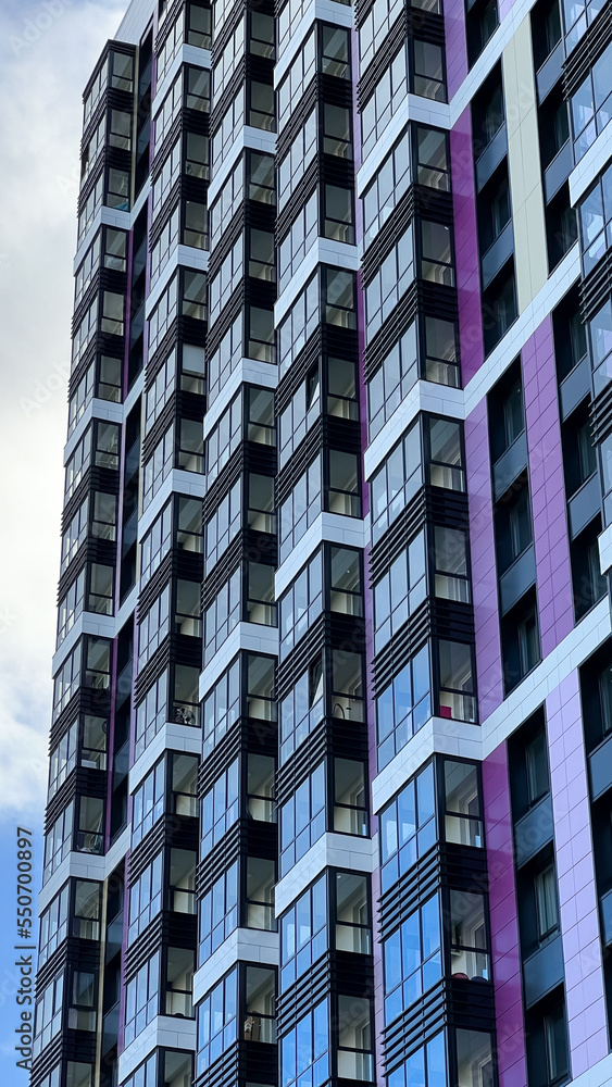 The facade of the building in purple,geometric patterns from windows ...