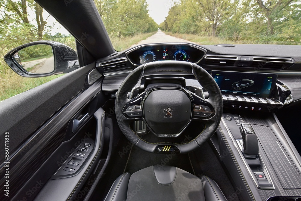 Peugeot 508 PSE. Sporty tuned car with plug-in hybrid drive. Cabin ...