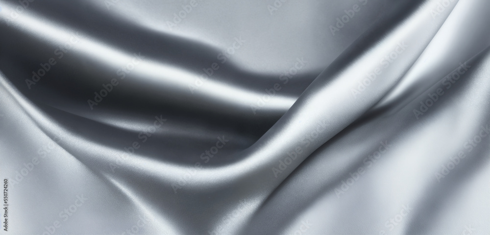Silver silk fabric that is smooth, shiny, and glittering with a ...