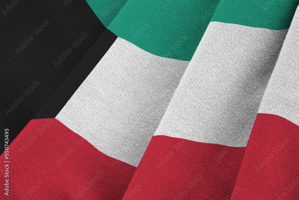 Kuwait flag with big folds waving close up under the studio light ...