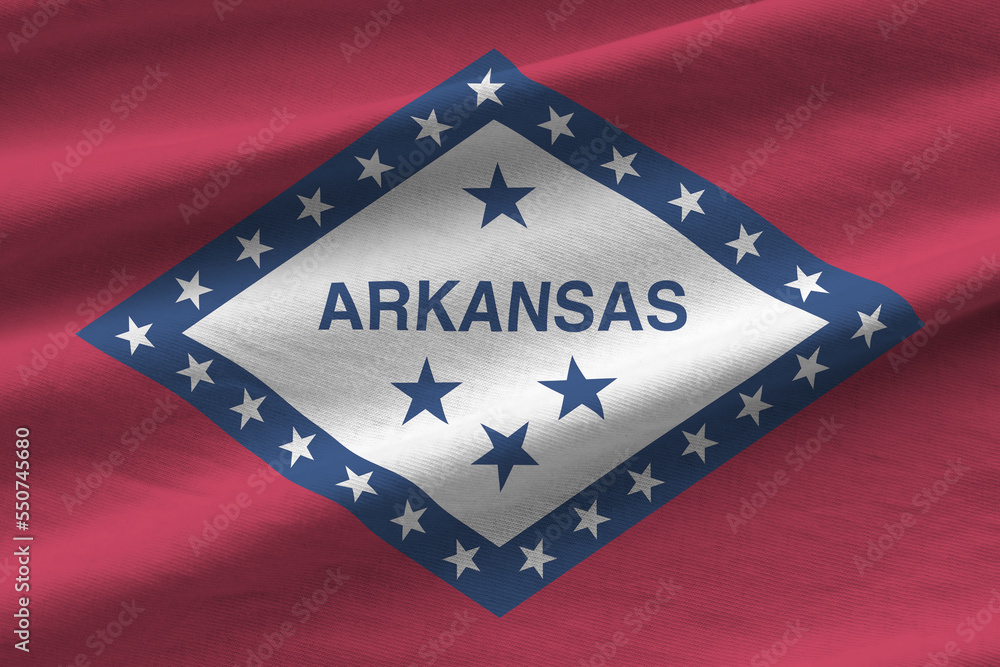Arkansas US state flag with big folds waving close up under the studio ...