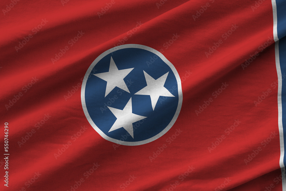 Tennessee US state flag with big folds waving close up under the studio ...