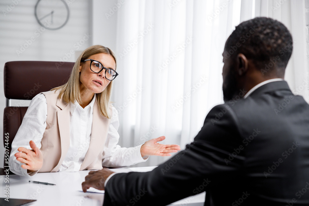Hiring, interview. Refusal to work due to racism. Business woman ...