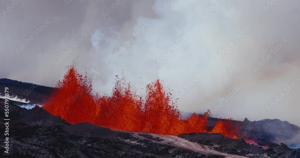Slow motion of volcano erupting molten hot lava fountain from the ...