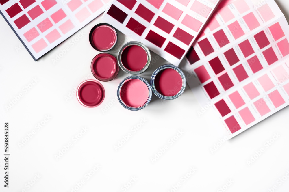 Tiny sample paint cans during house renovation, process of choosing ...