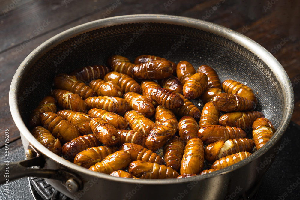 Stir-fried cocoon pupae is a special food in northeast China Stock ...