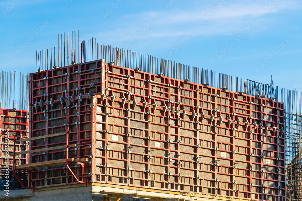 The foundation on reinforced concrete piles and the frame during the ...