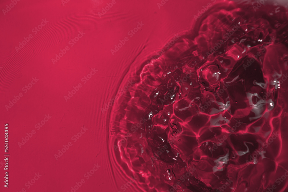 ripples on the water , viva magenta color of the year 2023 Stock Photo ...