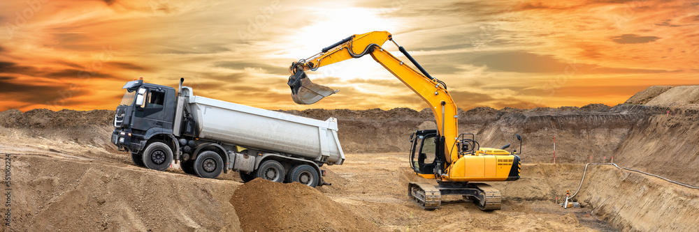 excavator is working and digging in construction site Stock Photo ...