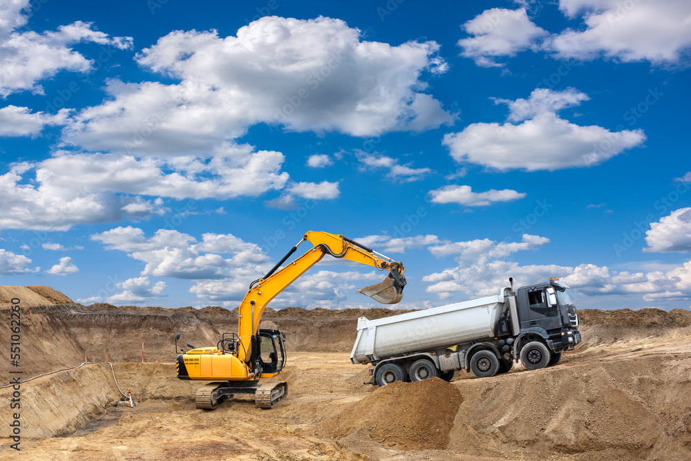 excavator is working and digging in construction site Stock Photo ...