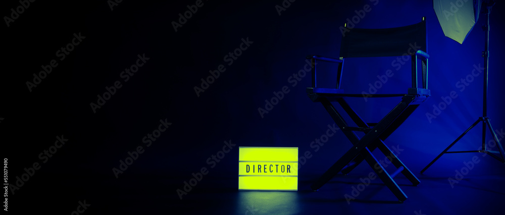Director chair with cinema lightbox sign Director text on it and ...