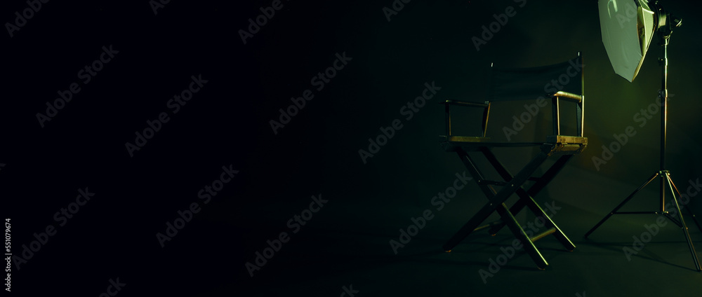 Director chair with cinema lightbox sign Director text on it and ...