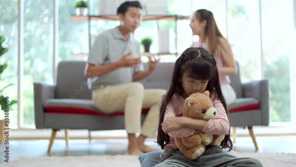 Unhappy family and issue. A little girl crying during her mother and ...