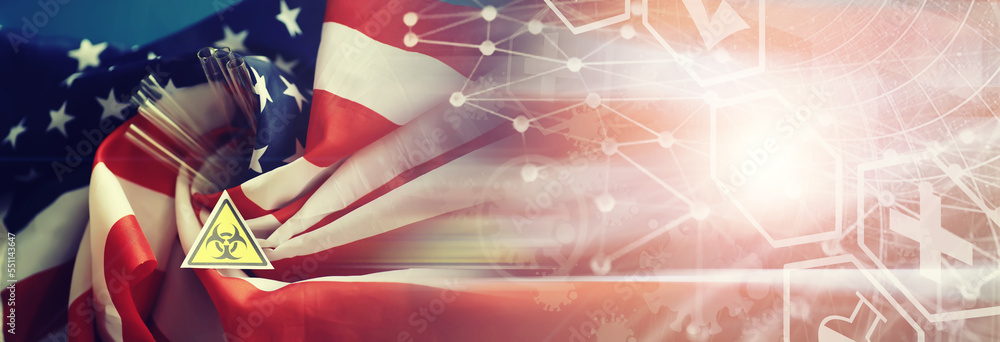 American flag, test tubes and biohazard sign. The concept of American ...
