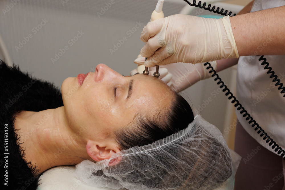 Close up face of woman face in white medical hat. Professional ...