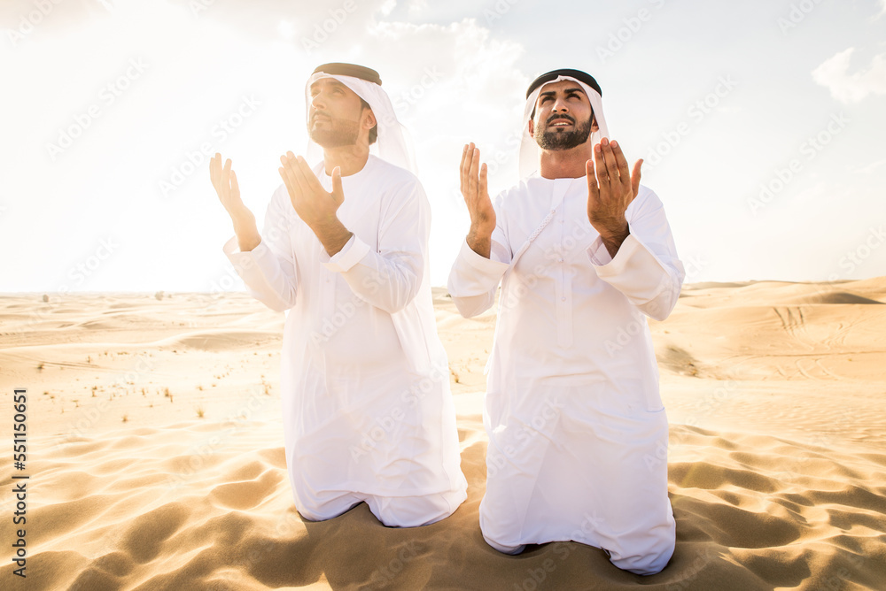 Arab men wearing typical middle eastern clothing in the desert Stock ...