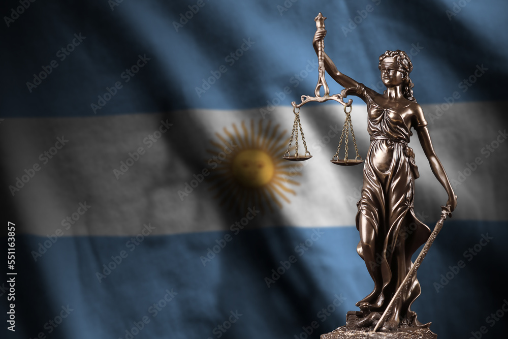 Argentina flag with statue of lady justice and judicial scales in dark ...