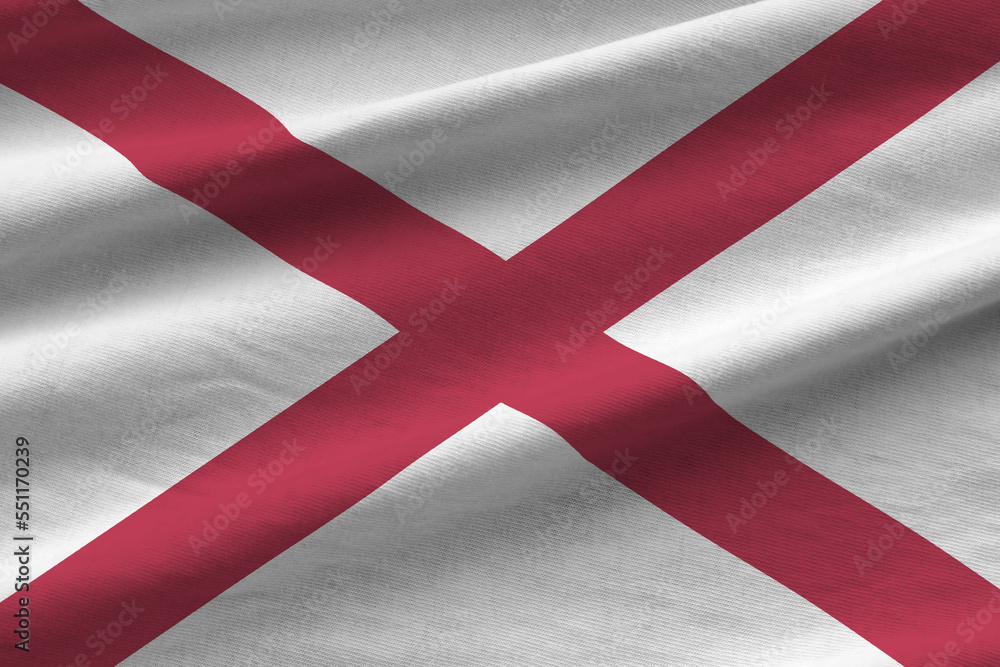 Alabama US state flag with big folds waving close up under the studio ...