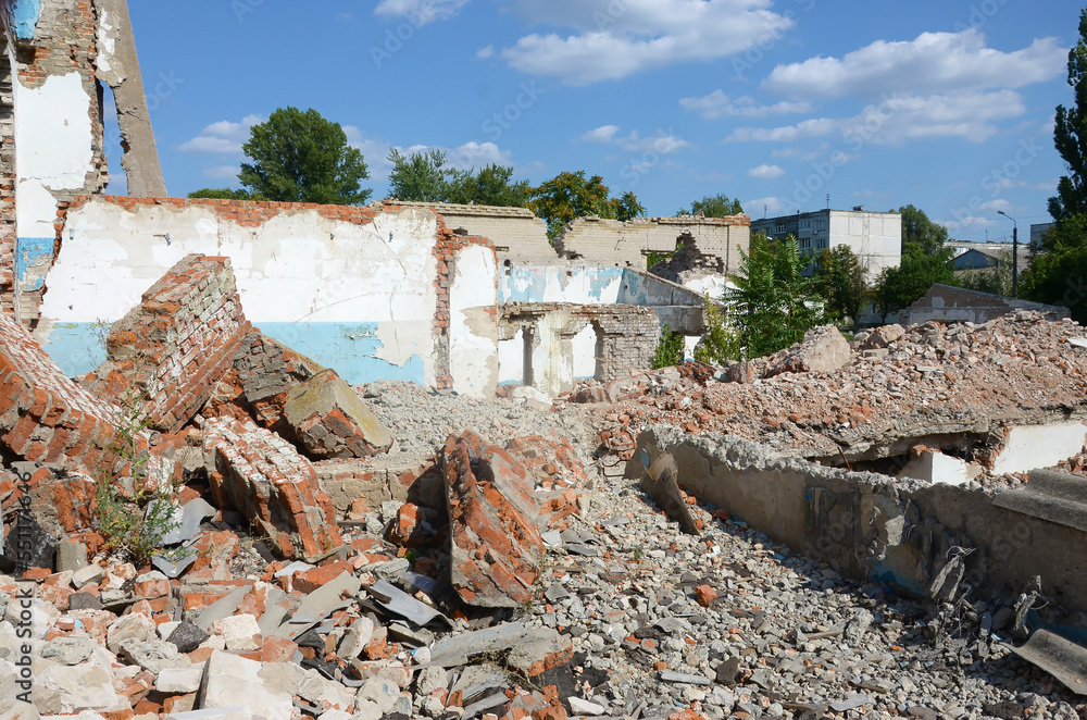 Collapsed industrial multistorey building in daytime. Disaster scene ...