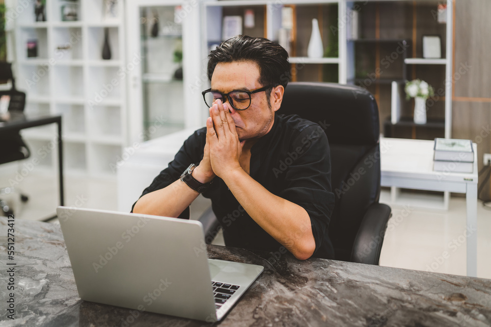 Asian business man stressed sitting headache. exhausted male employee ... Asian business man stressed sitting headache. exhausted male employee ...