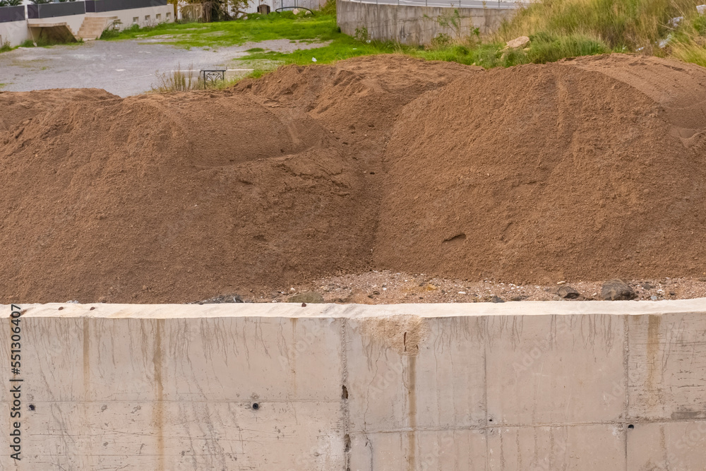 a large mountain of construction sand for the construction of the ...