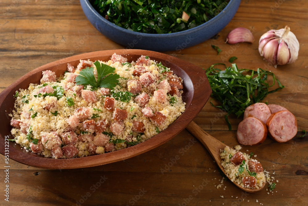 Foto de farofa with sausage, bacon and cabbage, typical Brazilian food ...