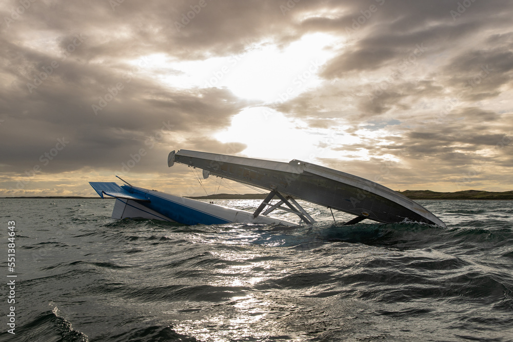 Float plane aka bush plane sinking in river water after a crash and ...