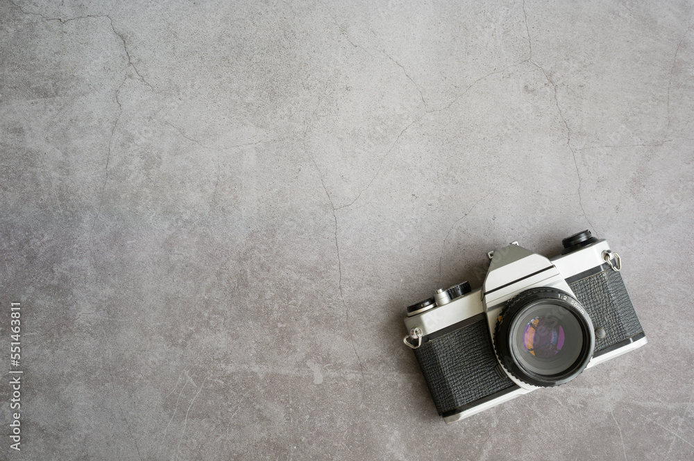 Vintage old camera on cement floor background. Film camera retro style ...