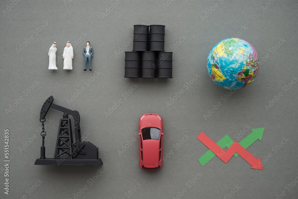Flat lay of Arab man, business man, oil tank, globe, pump jack, car and ...
