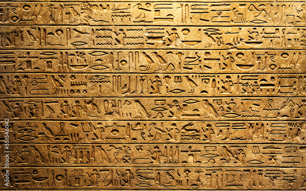 Old Egyptian hieroglyphs on an ancient background. Wide historical and ...