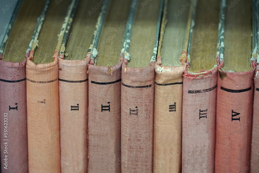 Covers of old books bound in cloth and volume numbers on the spine ...