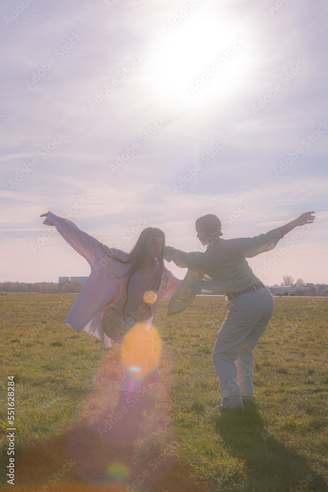 Women dancing in nature Stock Photo | Adobe Stock