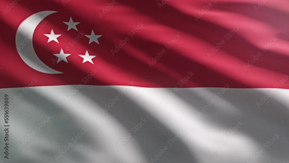 Strong wind shaking the national flag of the Republic of Singapore ...
