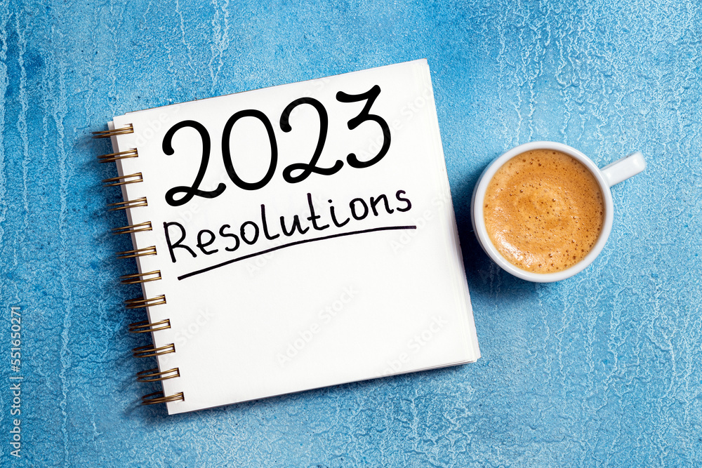 New year resolutions 2023 on desk. 2023 resolutions list with notebook ...