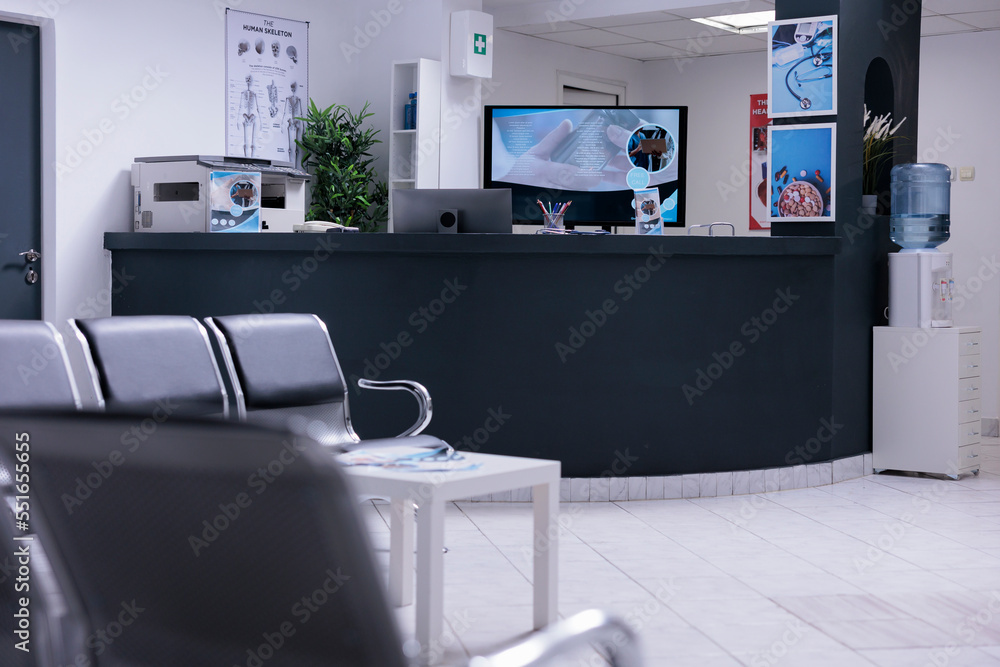 Nobody in hospital reception desk and waiting room at facility to ...