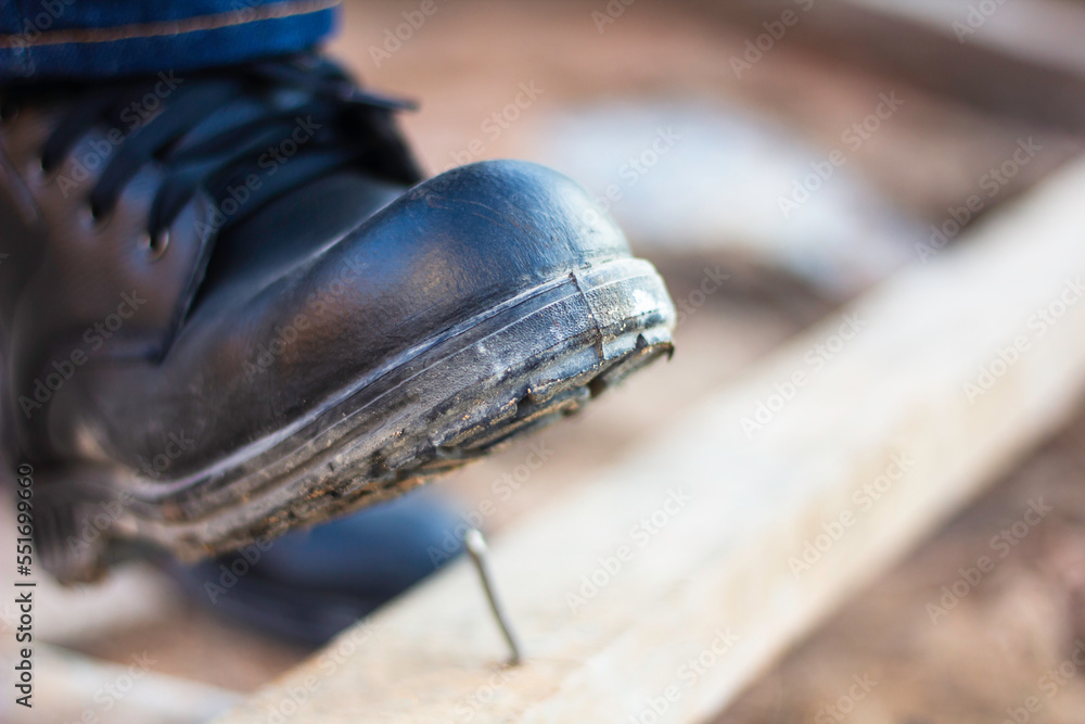 Foto de Wear safety shoes to ensure safety at work. construction ...