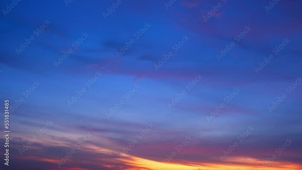 4K : Sky time lapse of colorful clouds during the moving sun. Beautiful ...