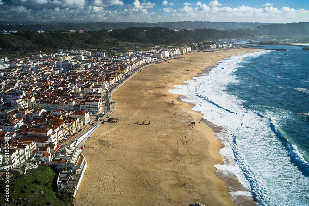 Top view of Nazare beaches and Nazare city and ocean. Traditional urban ...